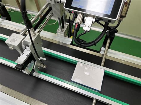 Application Fi 마킹기 잉크젯 날인기와 피더컨베이어코팅단상자 자동 날짜 날인