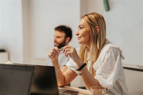 Business Team Analyzing Data And Discussing Growth Strategies In Office Stock Image Image Of