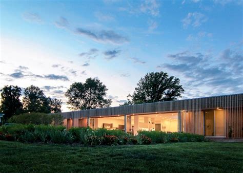 office mian ye wraps maryland home in cedar battens