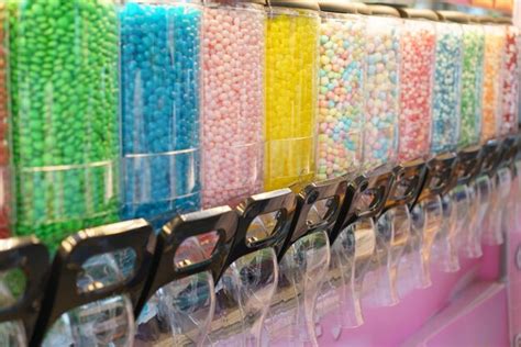 Premium Photo Candy Dispenser Array With Colorful Sweets