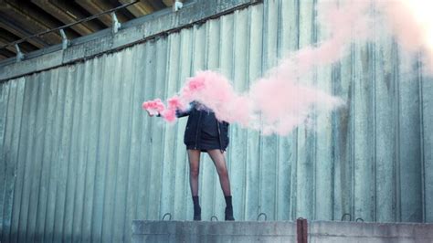 Premium Photo Girl Standing On Street With Smoke Bomb In Hand Woman