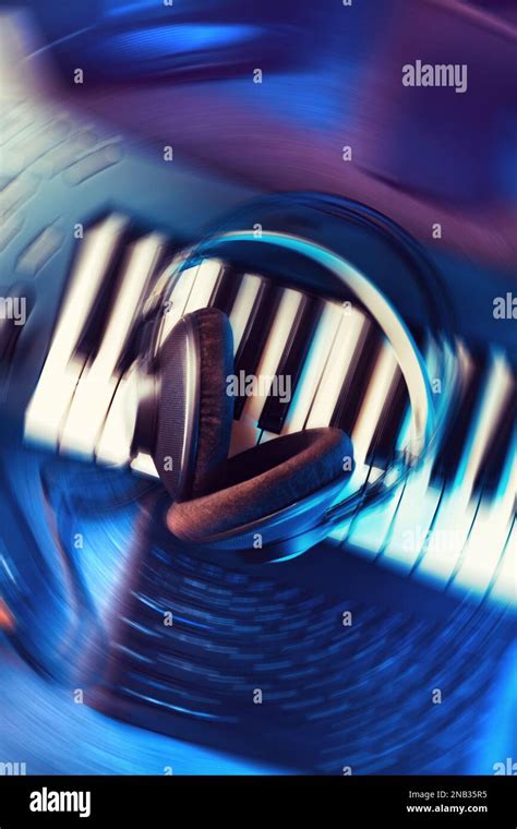 Keyboard Or Synthesizer With Headphones And Sound Card Computer