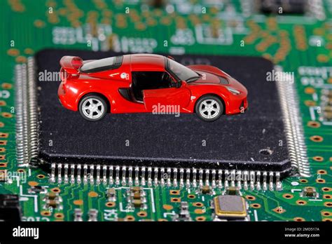 The Red Car Stands On The Microprocessor The Concept Of A Shortage Of