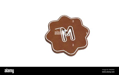 3d Rendering Of Gingerbread Cookie In Shape Of Symbol Of Manual Camera Letter Character Isolated