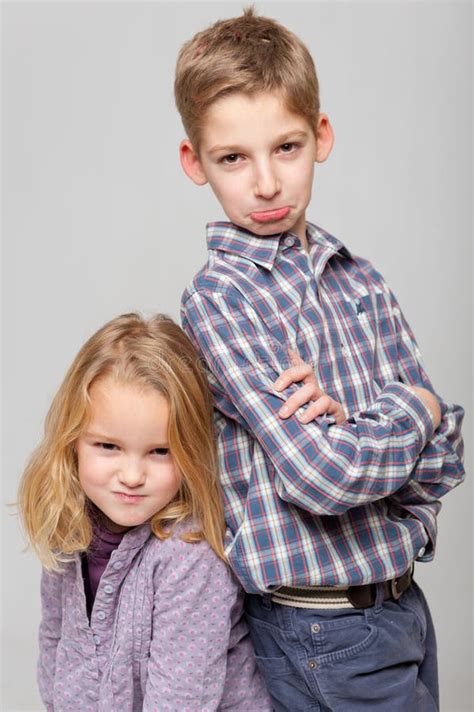 Hermanos Enojados Imagen De Archivo Imagen De Hermanos 46925939