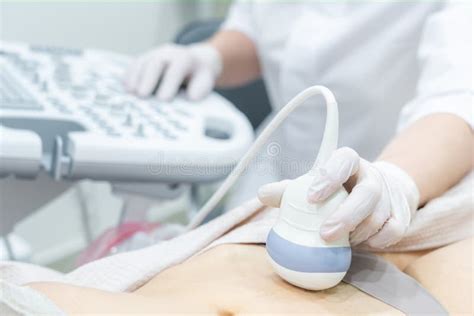 Gynecologist Doing Ultrasound Scan In Modern Clinic Stock Image Image