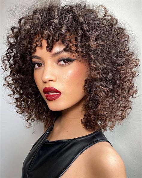 28 Most Popular Ways To Get Curly Hair With Bangs Right Now Layered