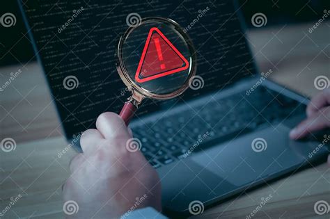 Hacker Or Programmer Using Laptop With Triangle Caution Warning Sign Coding Cryptography Stock