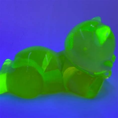 Fenton Art Fenton Vaseline Glass Daydreaming Bear Cub Yellow