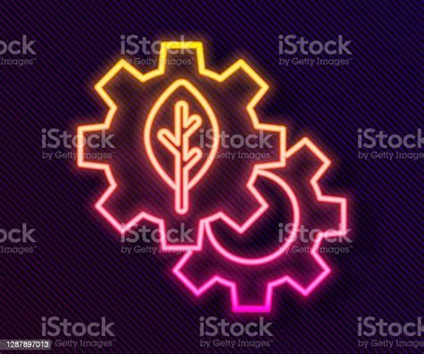 검은 배경에 고립 된 기어 기계 아이콘에 빛나는 네온 라인 잎 식물 생태 친환경 기술 세계 환경의 날 라벨 벡터 개념에 대한