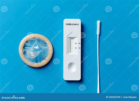 Rolled Up Condom And Covid 19 Test Device Stock Image Image Of Device Diagnostic 226525349