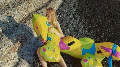 Alla Inflates A Rare Inflatable Dragon On The Beach With Her Mouth Allaalexinflatable