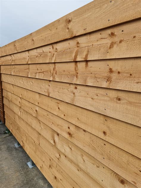 Red Class Feather Boards 22mm Tuin Uk