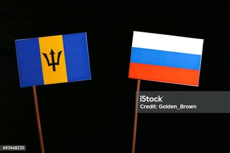 검은 배경에 고립 된 러시아 국기와 함께 바베이도스 플래그 0명에 대한 스톡 사진 및 기타 이미지 0명 개념 경쟁 Istock