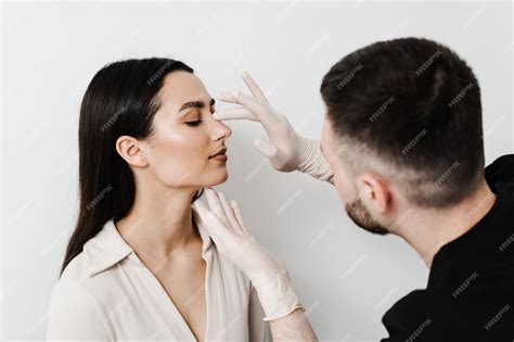 Premium Photo Ent Doctor Is Touching Nose And Consulting Girl Patient
