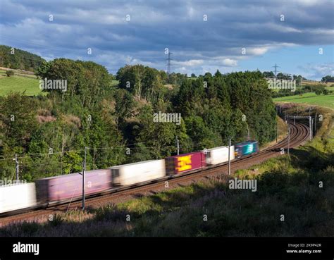 High Speed Intermodal Container Train On The West Coast Mainline Passing Through Cumbria Hauled
