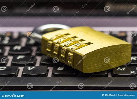 Closed Combination Padlock On A Laptop Keyboard Symbolizing Data