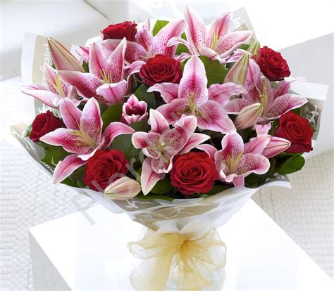 Stargazer Lily And Red Roses Bouquet