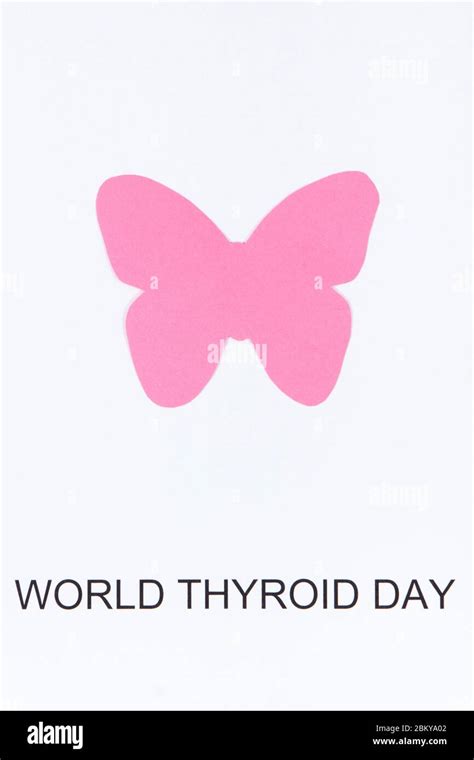 Pink Thyroid Shape Made Of Paper And Inscription World Thyroid Day
