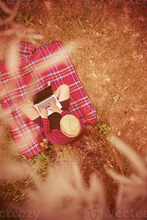 Top View Of Man Using A Laptop Computer Under The Tree 10663973 Stock