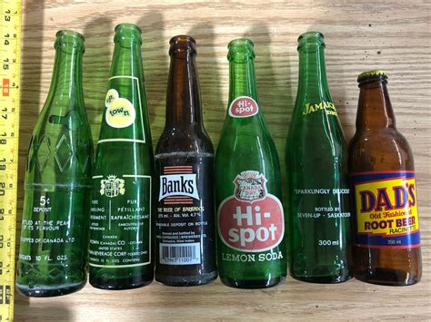 Assorted Pop Bottles And Fabric Bag Assorted Pop Bottles And Fabric Bag