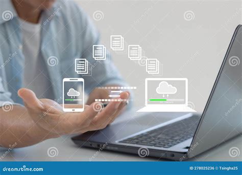 Man Hand Transfer File In Screen Smartphone And Laptop Data Transfer