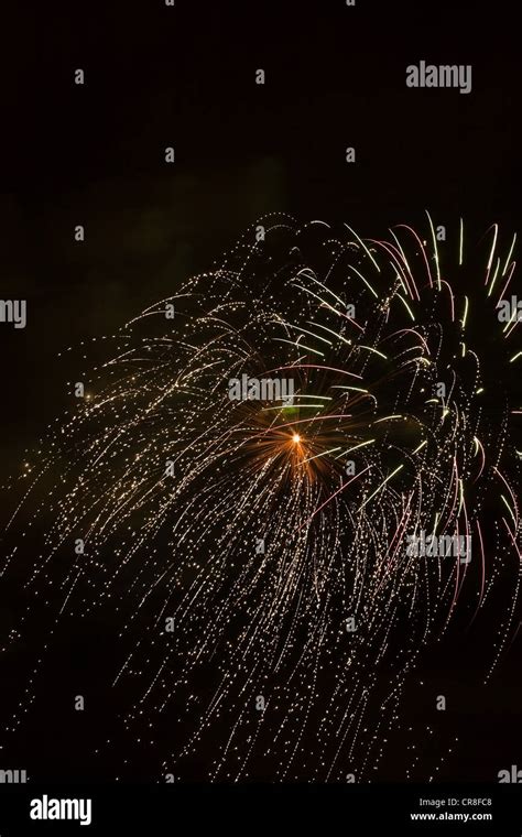 Fireworks Exploding Against Night Sky Stock Photo Alamy