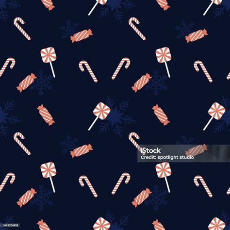 롤리팝 사탕 눈송이 매끄러운 패턴 배경이 있는 진한 파란색 Bg에 빨간색과 흰색 색상의 사탕 지팡이 겨울 휴가 직물 선물 포장 스크랩북 인사말 카드 디자인 프로젝트에 가장