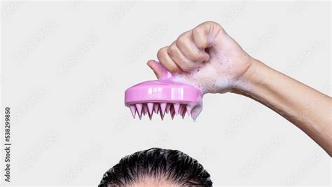 Girl Top Of Head With Shampoo Foam On Hair Using Silicone Brush For Scalp Massage Hair Growth