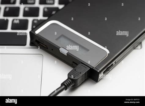 External Hard Disk Over Laptop Keyboard Stock Photo Alamy