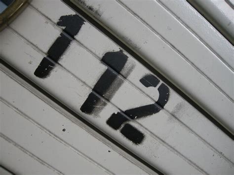 Premium Photo Number On Closed Shutter