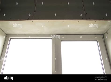 Windows With Plasterboard Slopes Moisture And Fungus Apartment Without Repair Stock Photo Alamy