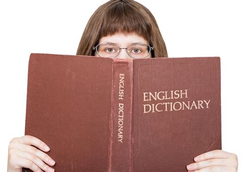 Girl Looks Over English Dictionary Book Isolated Premium Photo