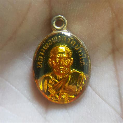 เหรียญเม็ดแตง หลวงพ่อทวดอาจารย์ทิม ปี22 ลงยาสีเขียว Ennxo