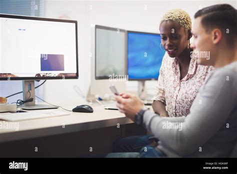 Programmers Cooperating At IT Company Developing Apps Stock Photo Alamy