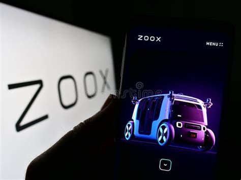 Person Holding Cellphone With Website Of Us Autonomous Vehicle Company