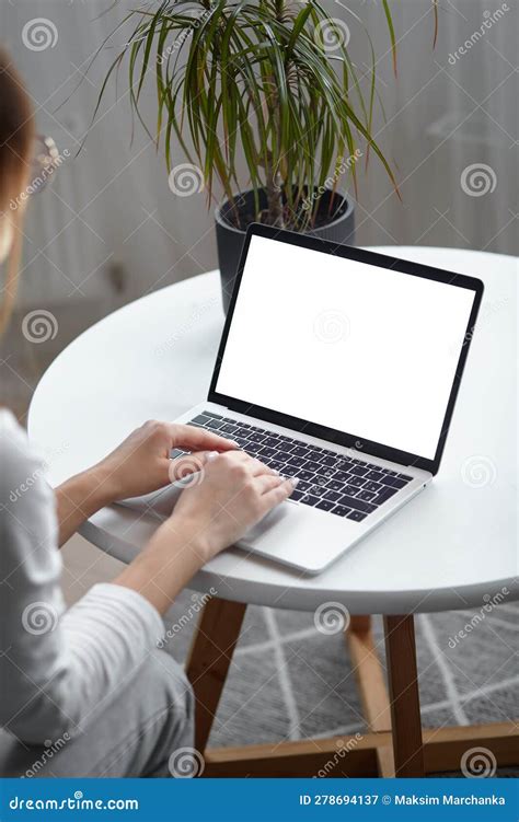 Mockup White Screen Laptop Woman Using Computer While Sitting At Table At Home Back View Stock