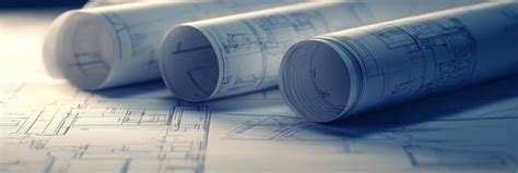 Rolled Up Blueprints Architectural Design And Construction Plans