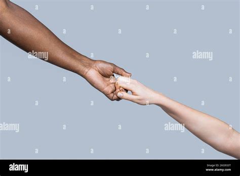 Woman And African Woman Hand Helping Hand Rescue Multiathnic People Helping Hands Rescue