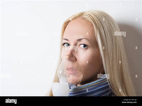 Girl Treated With Inhaler Stock Photo Alamy