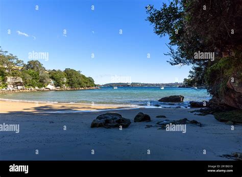 Rocks On The Sand Of Collins Beach In Manly Sydney Looking Out Into