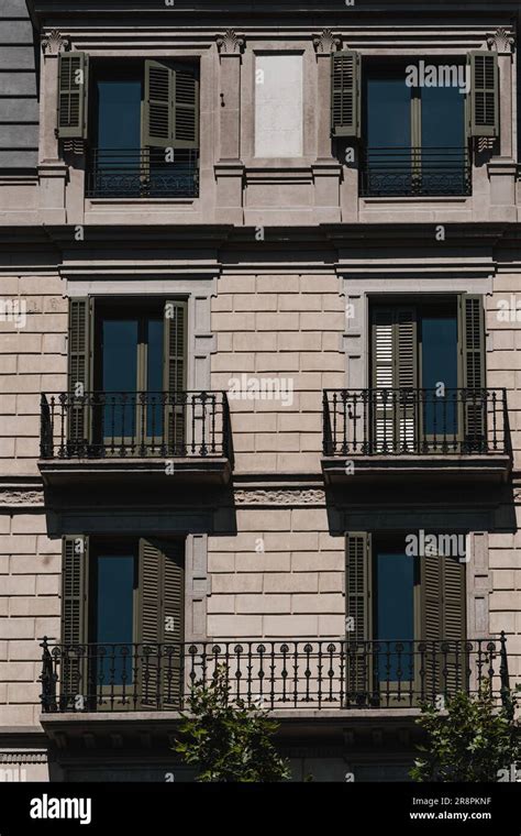 The Pastel Colored Facade Of A Building In Barcelona Adds A Touch Of