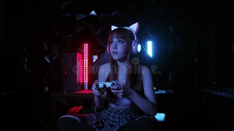 Gamer Girl Sitting On Gaming Chair And Playing A Game Using Joystick