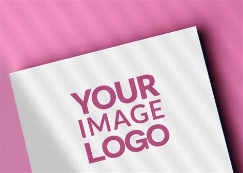 Logo Mockup In White Paper With Pink Background Mediamodifier