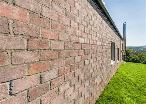 Long Brick House By Foldes Architects Has A 17 Metre Long Bookshelf
