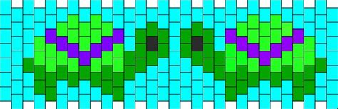 An Image Of A Pixellated Pattern With Green And Purple Flowers In The Center On A Blue Background