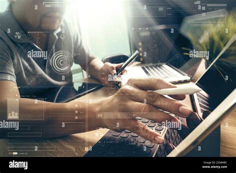 outsource developer working on marble desk working laptop computer