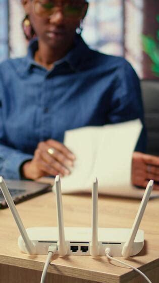 Young Woman Struggling With Weak Internet Connection At Home Pulling Out Lan Cable And