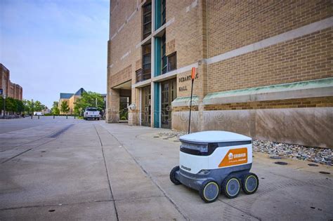 Autonomous Delivery Robot On University Campus Walkway Low Angle View Editorial Stock Image