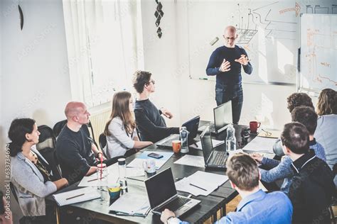 Relaxed Informal It Business Startup Company Meeting Team Leader Discussing And Brainstorming